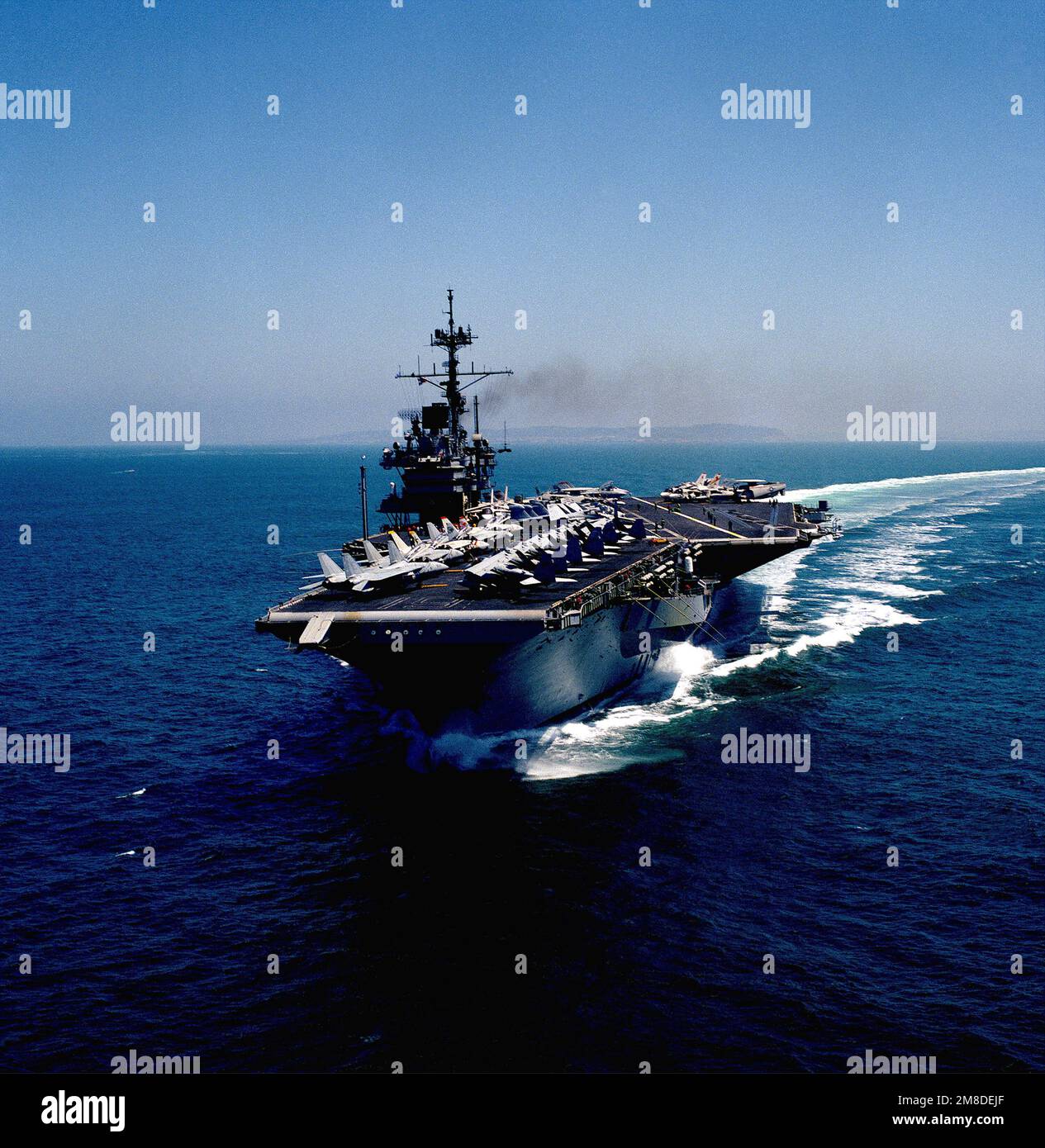 A port bow view of the aircraft carrier USS RANGER (CV-61) underway off ...