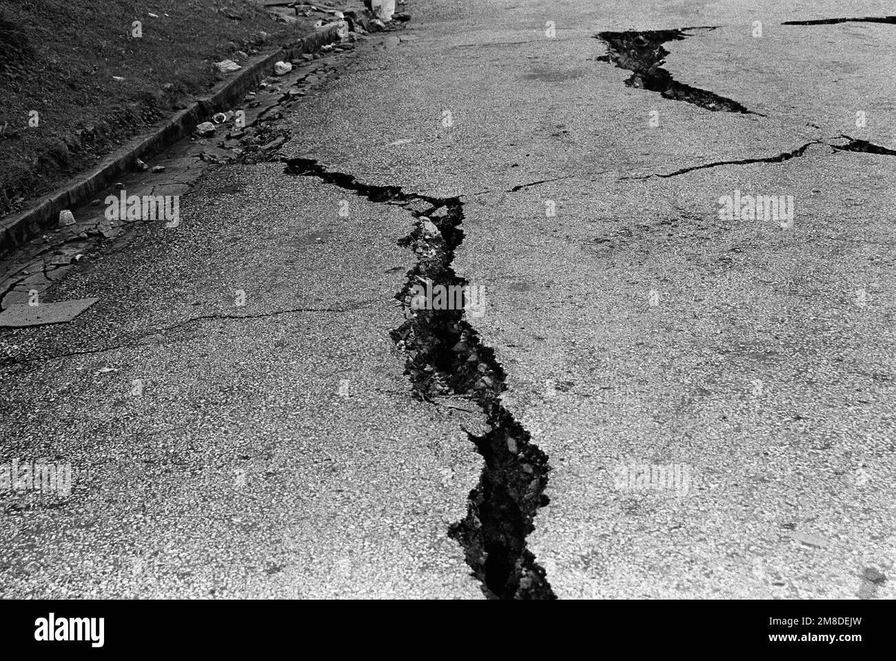 A view of a street damaged by the earthquake of July 16, 1990. Country ...