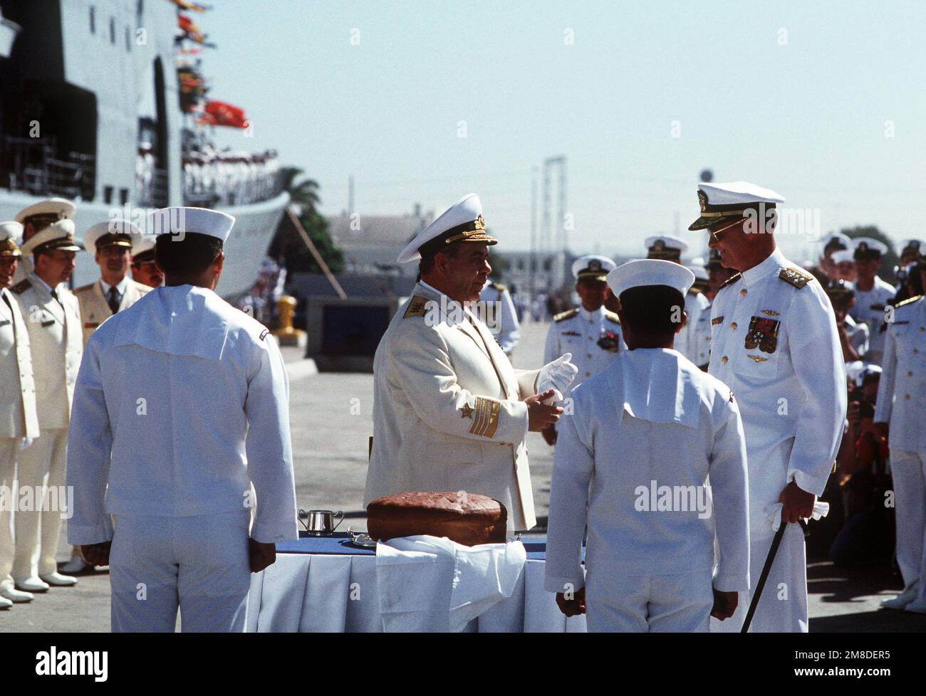 U.S. Pacific Fleet commander ADM Charles R. Larson shares a traditional ...
