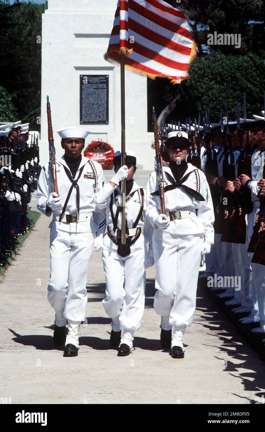 United States Marines and Soviet sailors present arms as a United ...