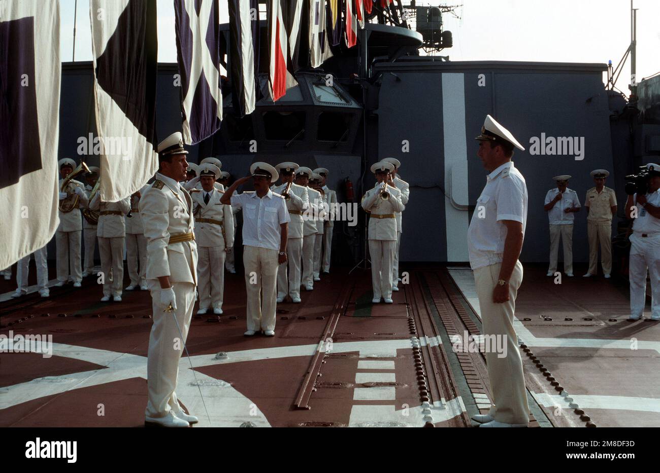 A Soviet navy captain-lieutenant, left, reports to a rear admiral ...