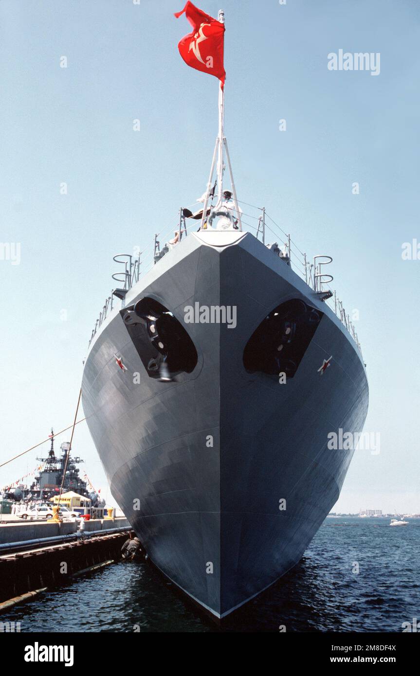 A Soviet sailor stands watch beneath the jack flying on the bow of the ...