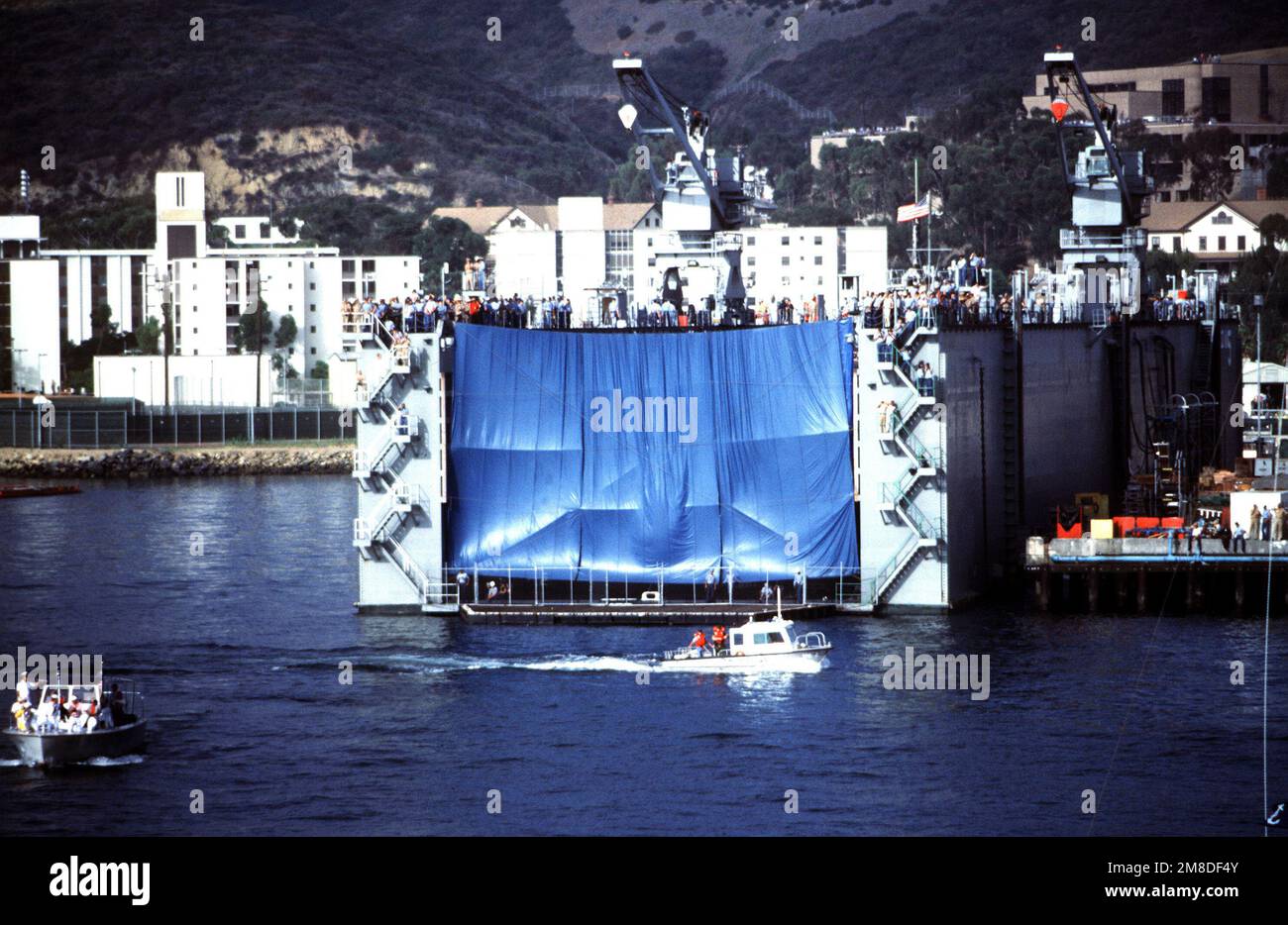Sailors gather atop a floating dry dock at the Naval Submarine Base ...