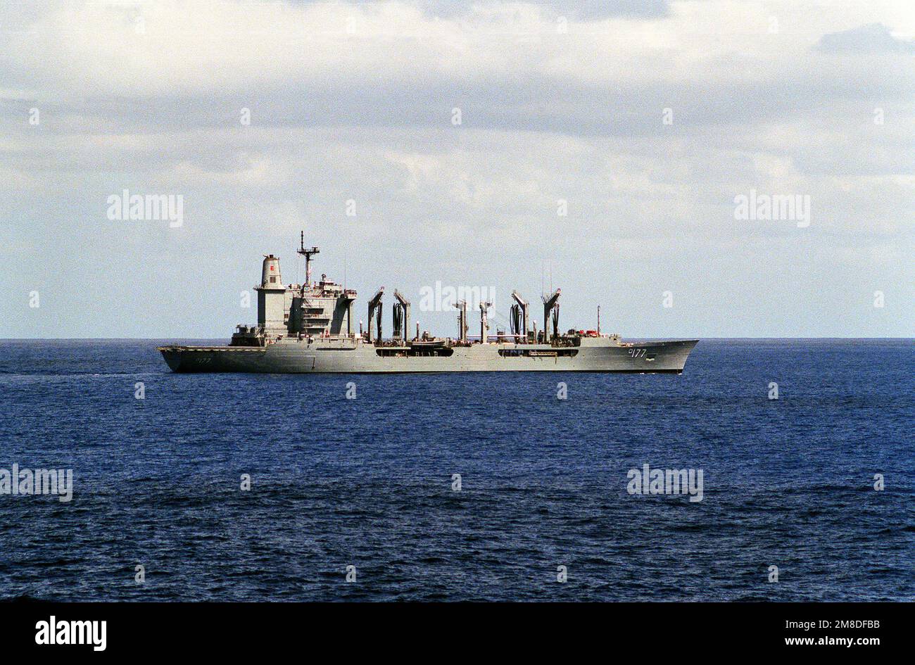 A starboard beam view of the oiler USS CIMARRON (AO-177) en route to ...