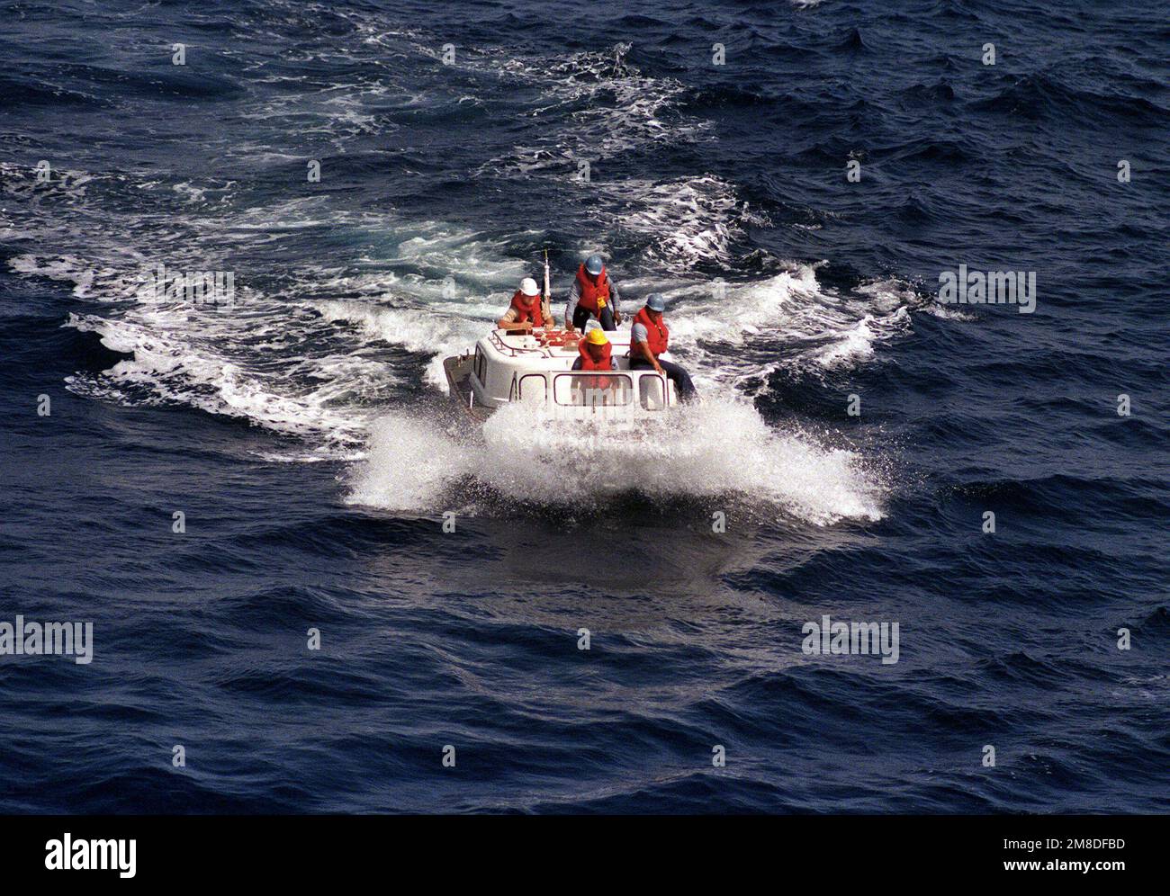 Crewmen return to the guided missile destroyer USS GOLDSBOROUGH (DDG-20 ...