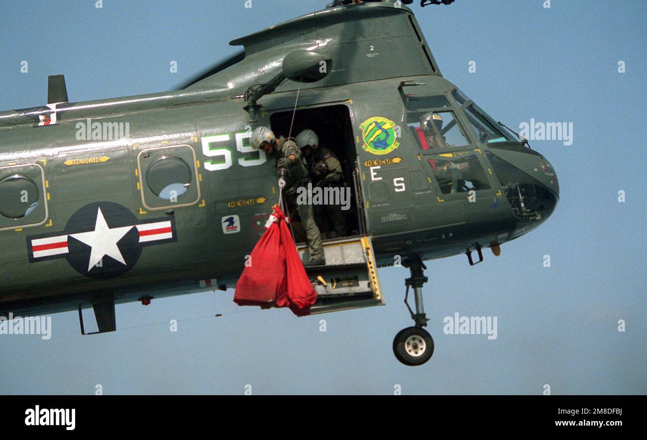 A UH-46 Sea Knight helicopter of Helicopter Combat Support Squadron 11 ...