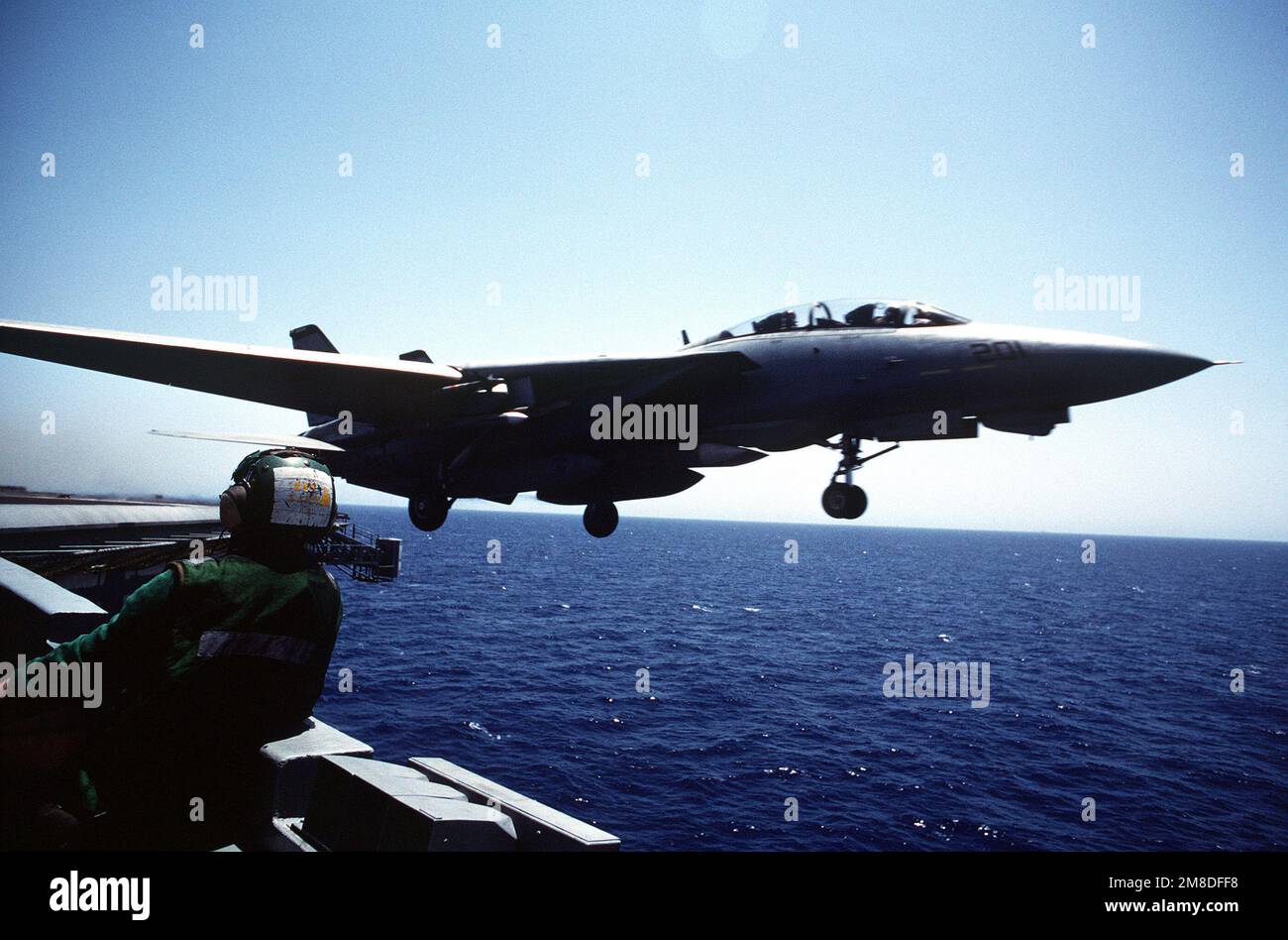 A Fighter Squadron 142 (VF-142) F-14A Tomcat aircraft is launched from ...