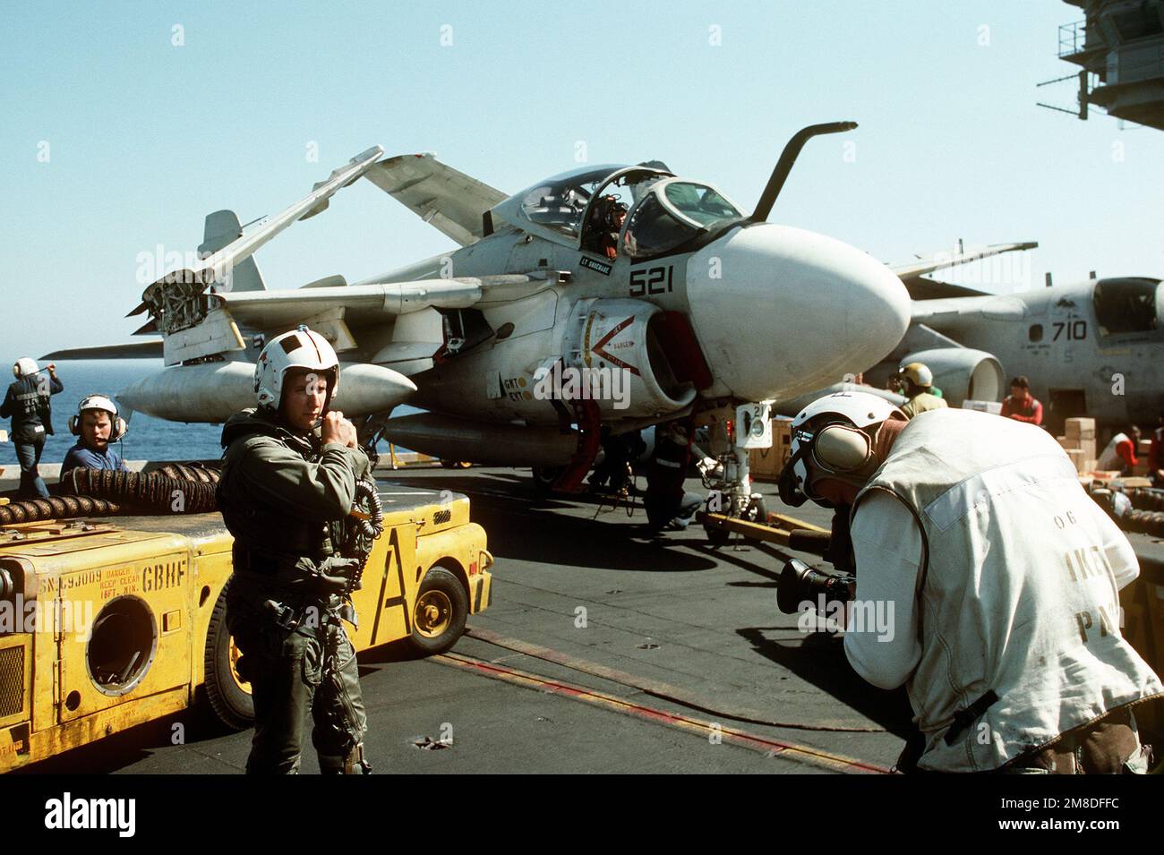 An Attack Squadron 34 (VA-34) A-6E Intruder aircraft flight crewman is ...