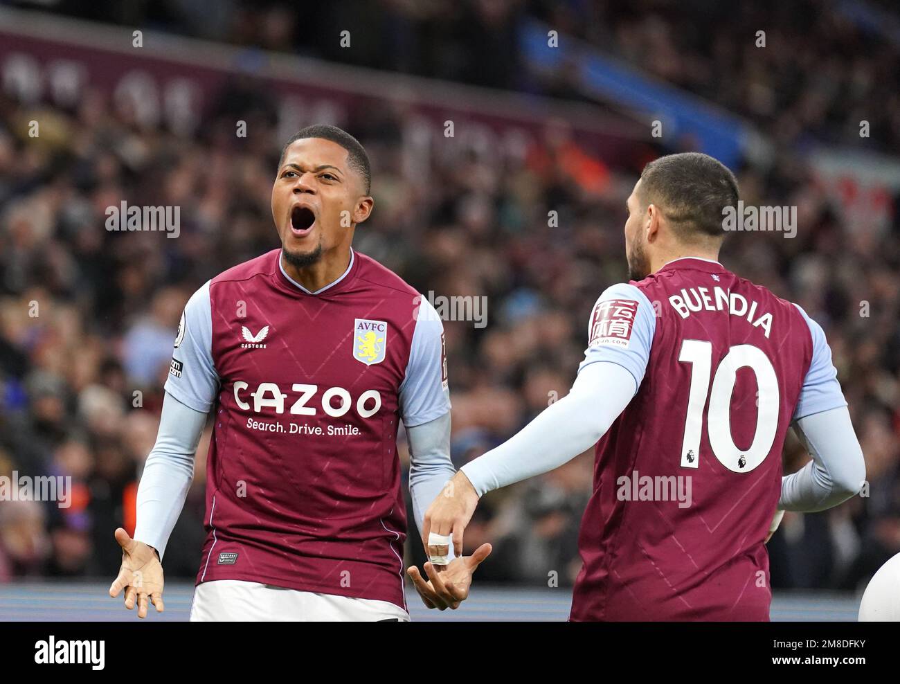 Aston Villa's Leon Bailey (left) celebrates scoring their side's first ...