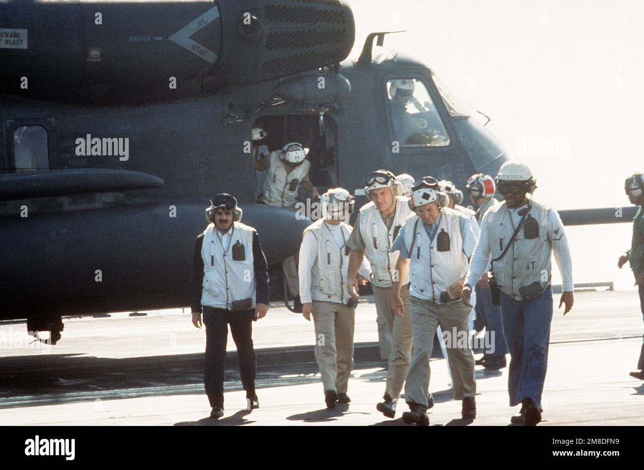 Secretary of Defense Dick Cheney, fourth from left, and his assistants ...