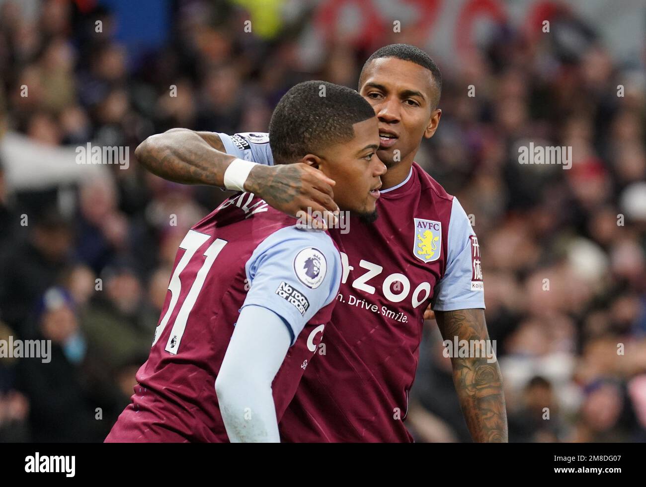 Aston Villa's Leon Bailey (left) celebrates scoring their side's first ...