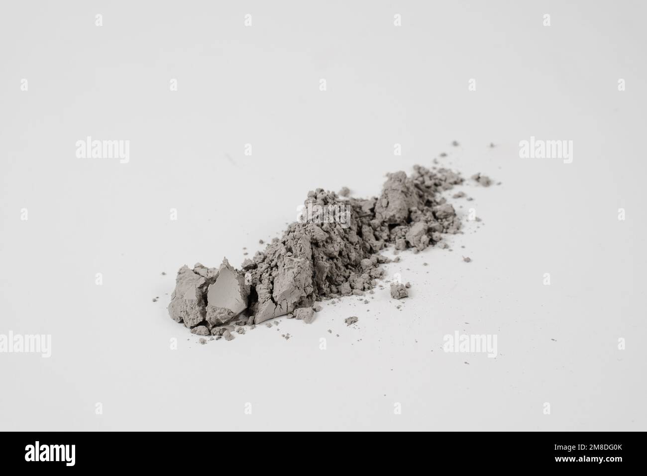 Silicon carbide abrasive powder for leveling stones isolated on white ...