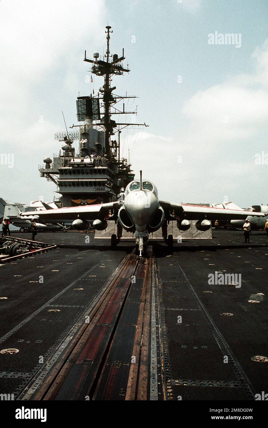 An Attack Squadron 196 (VA-196) A-6E Intruder aircraft sits ready for ...