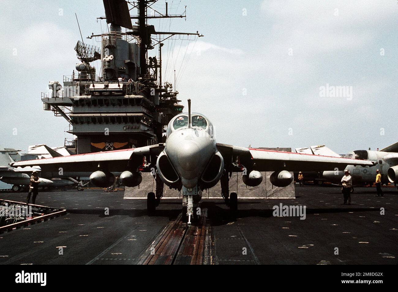 An Attack Squadron 196 (VA-196) A-6E Intruder aircraft sits ready for ...