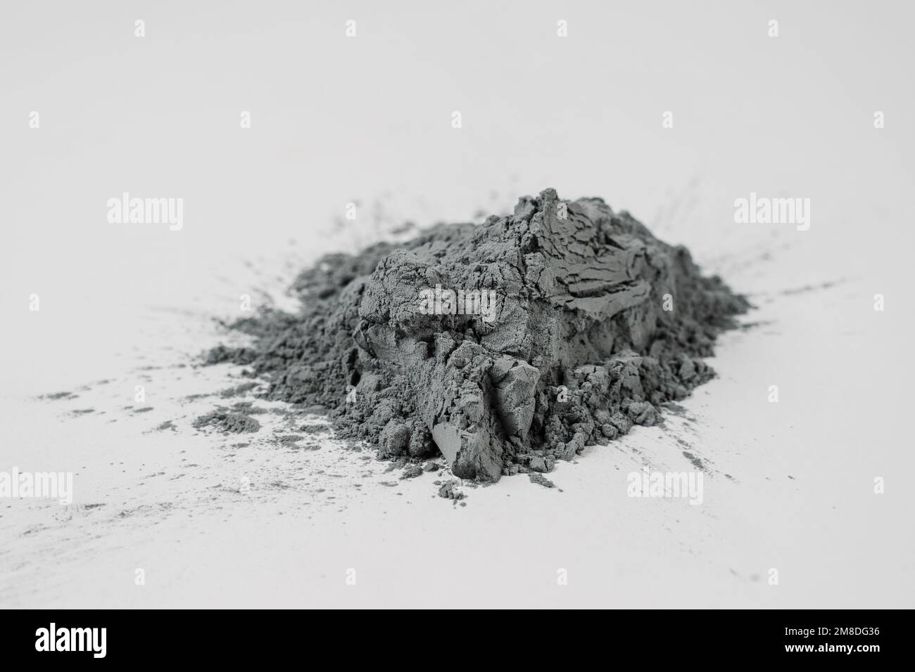 Silicon carbide abrasive powder for leveling stones isolated on white ...