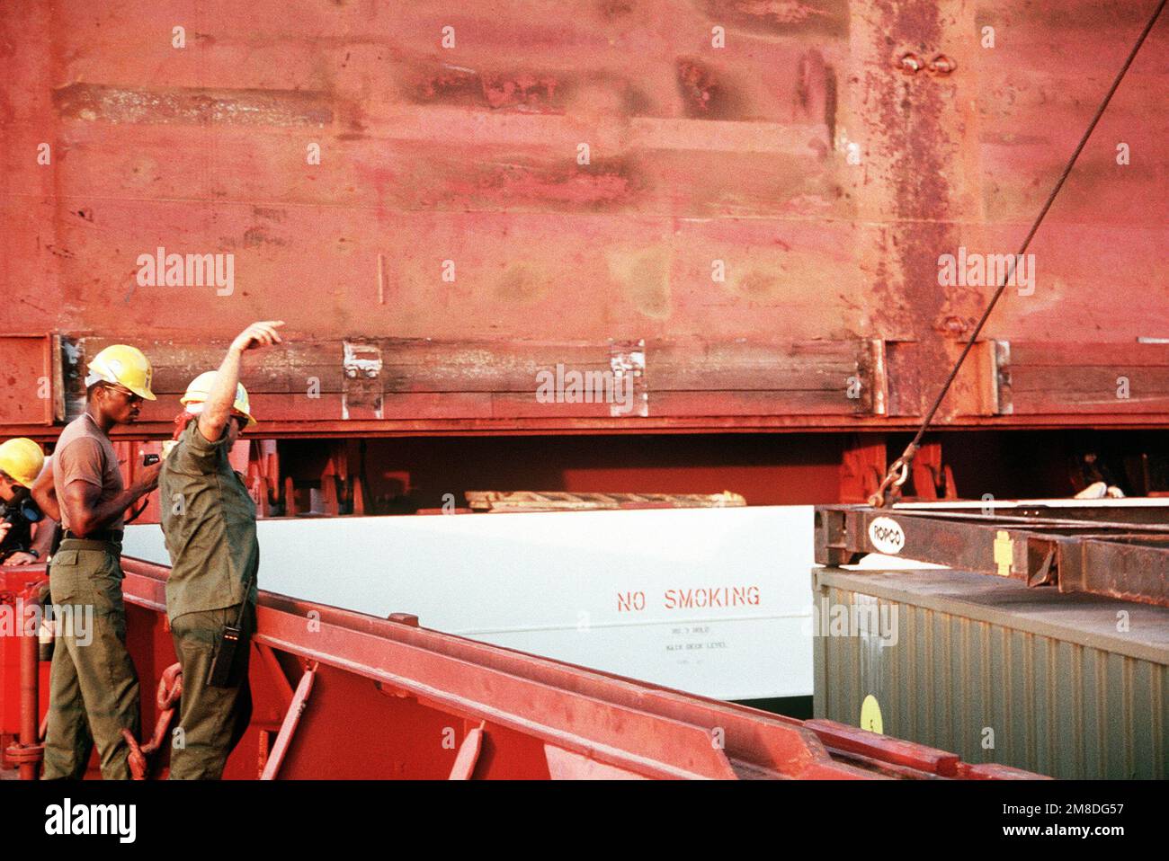 A Seabee aboard the maritime pre-positioning ship PVT. Harry Fisher (T ...