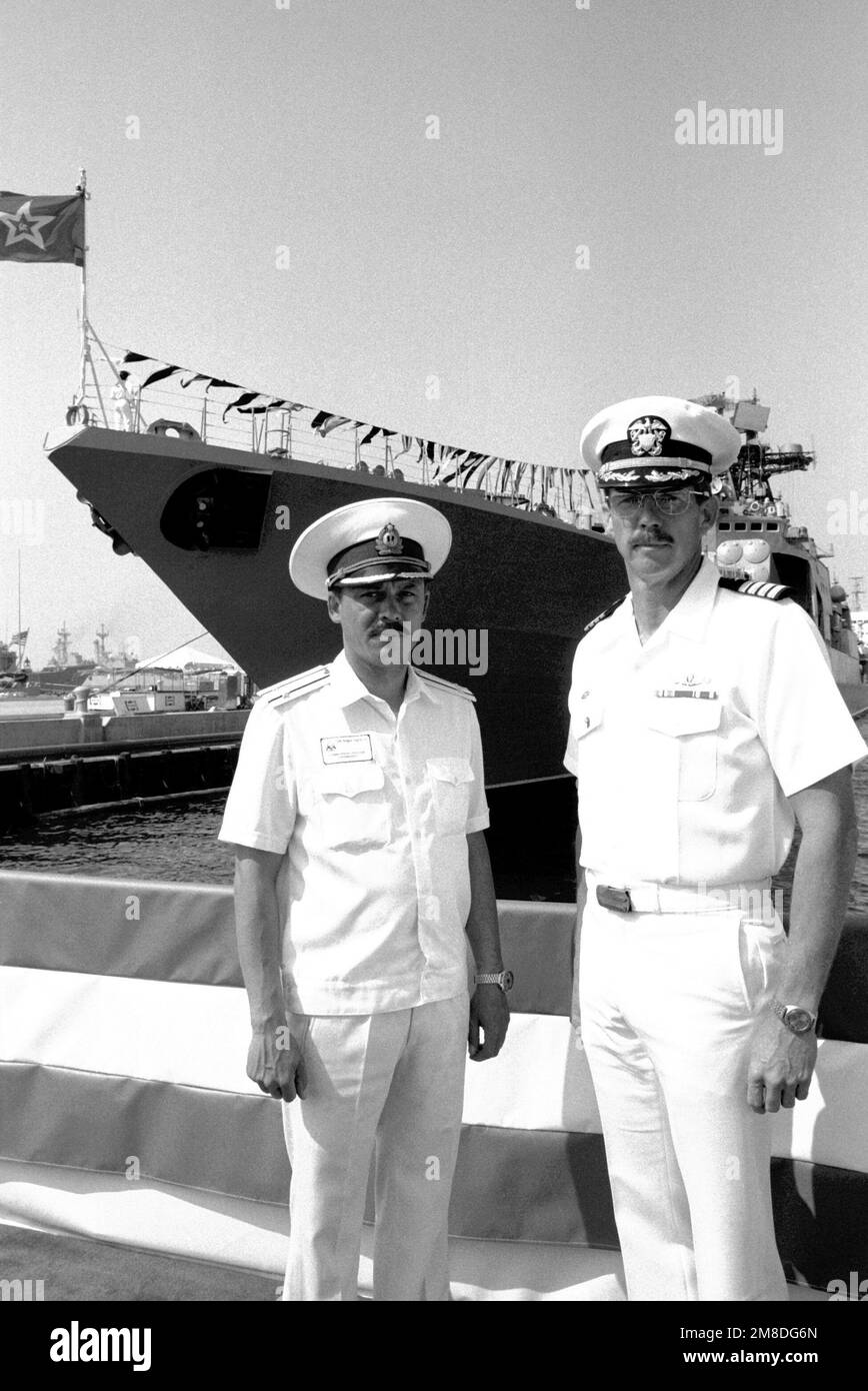 Captain Second Rank Sergey Tegentsev, left, commanding officer of the ...