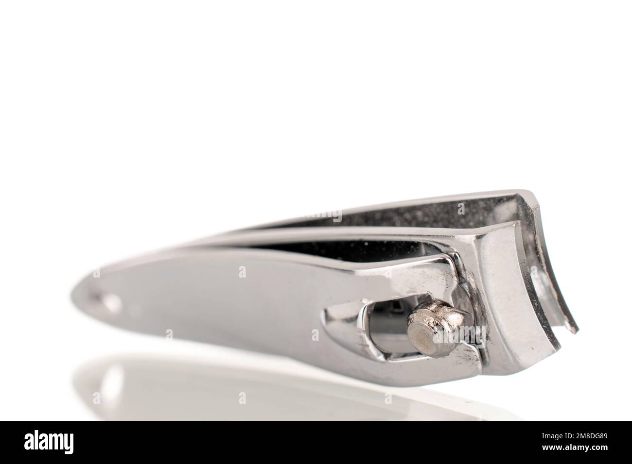 Single metal nail scissors, macro, isolated on white background Stock ...