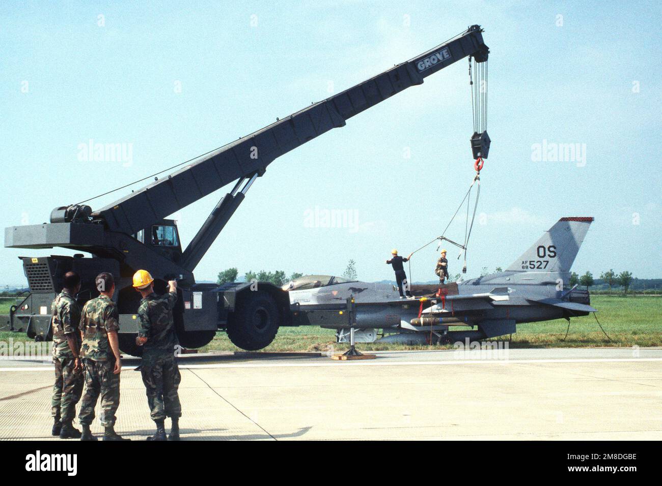 Members of the 51st Tactical Fighter Wing crash recovery crew stand ...