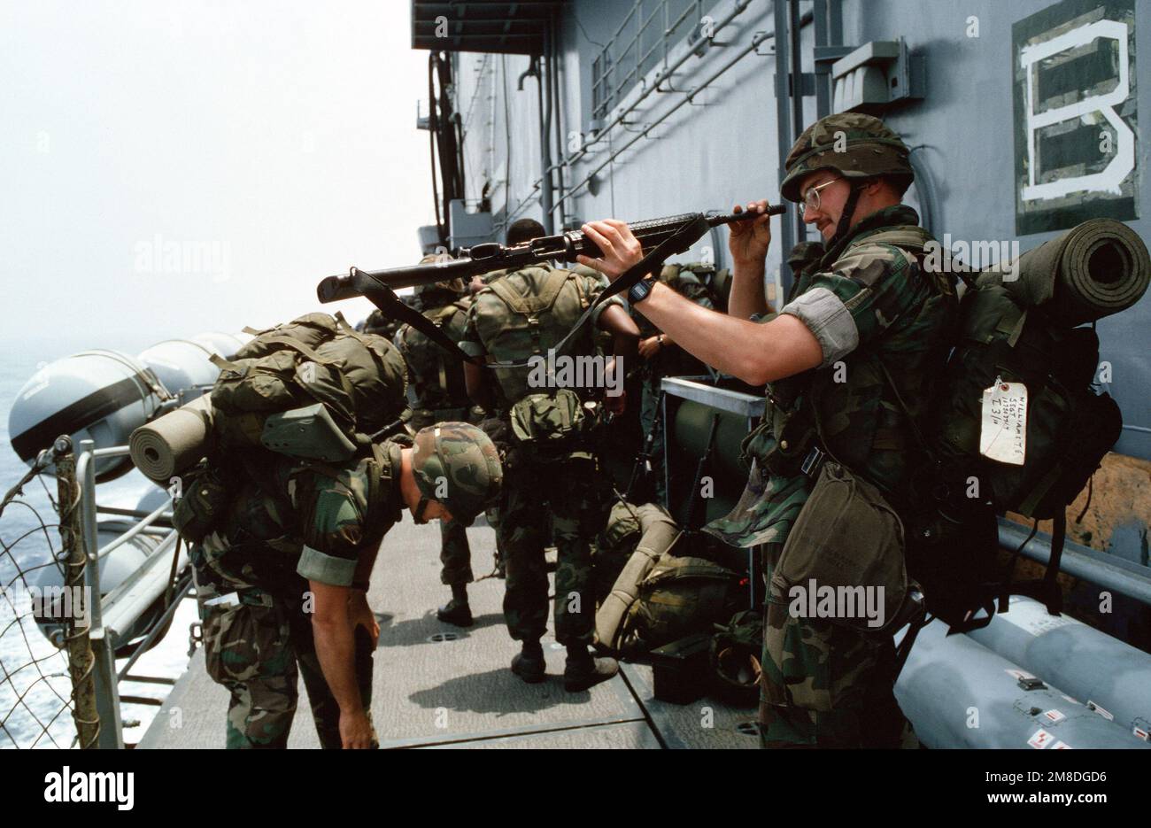 Marines of the 22nd Marine Expeditionary Unit (22nd MEU) check their ...