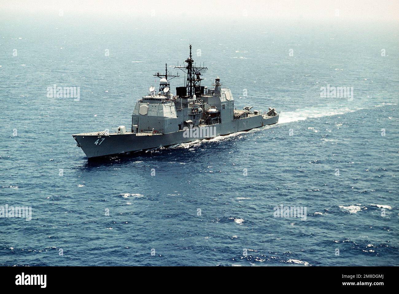 A port bow view of the guided missile cruiser USS TICONDEROGA (CG-47 ...
