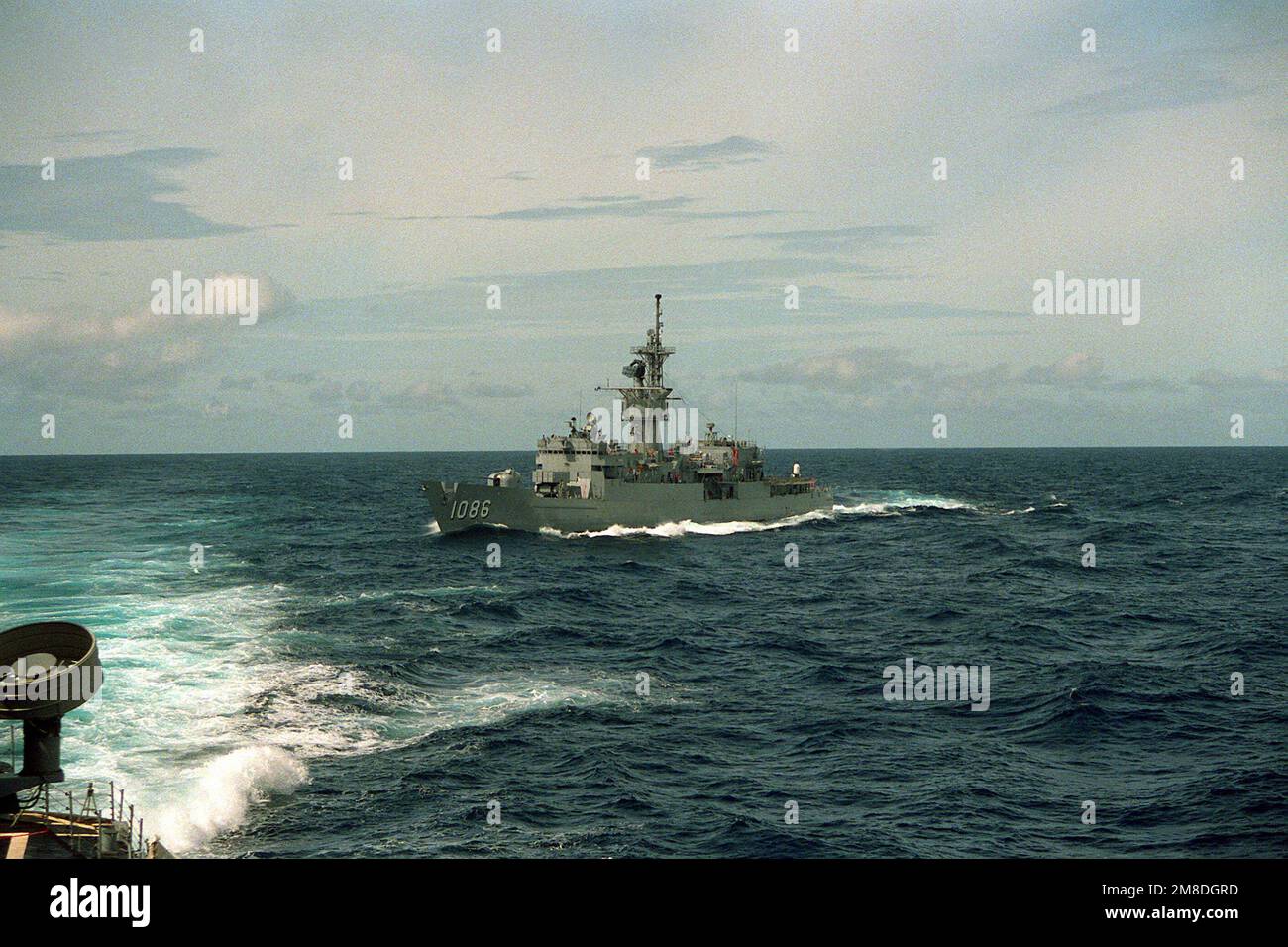 A port bow view of the frigate USS BREWTON (FF-1086) underway north of ...