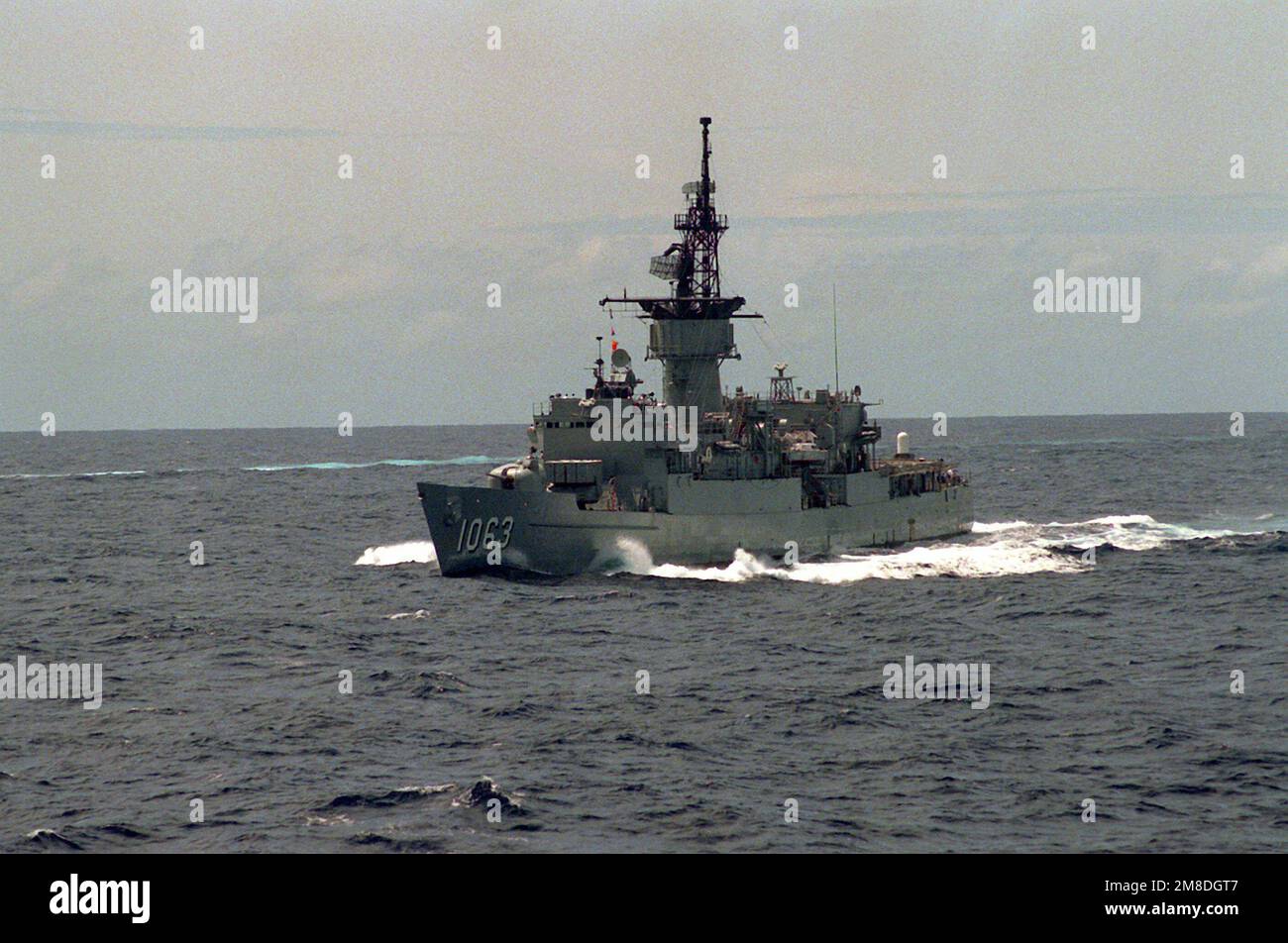 A port bow view of the frigate USS REASONER (FF-1063) underway north of ...