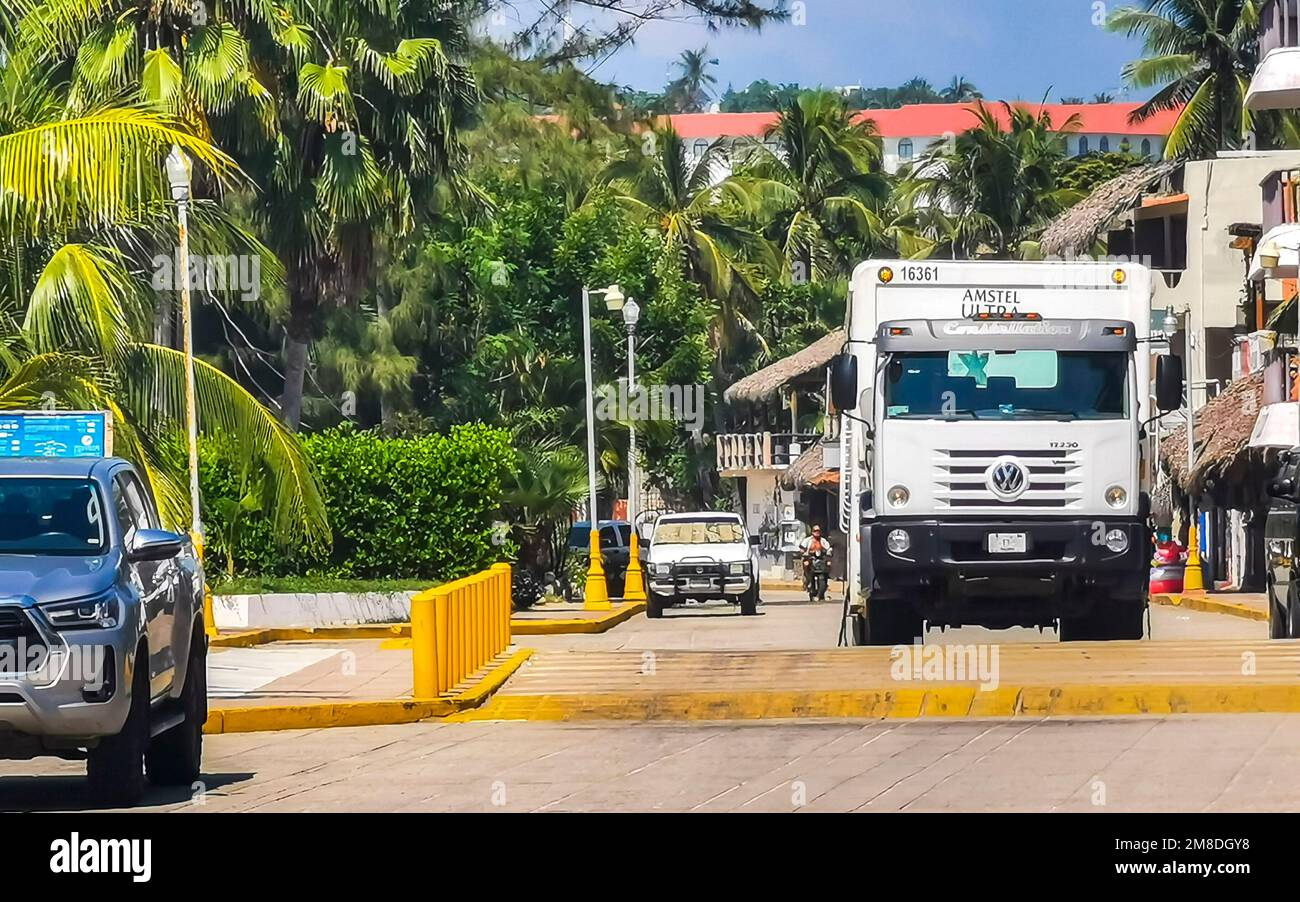 Colorful streets cars high traffic stores people buildings and trade in ...
