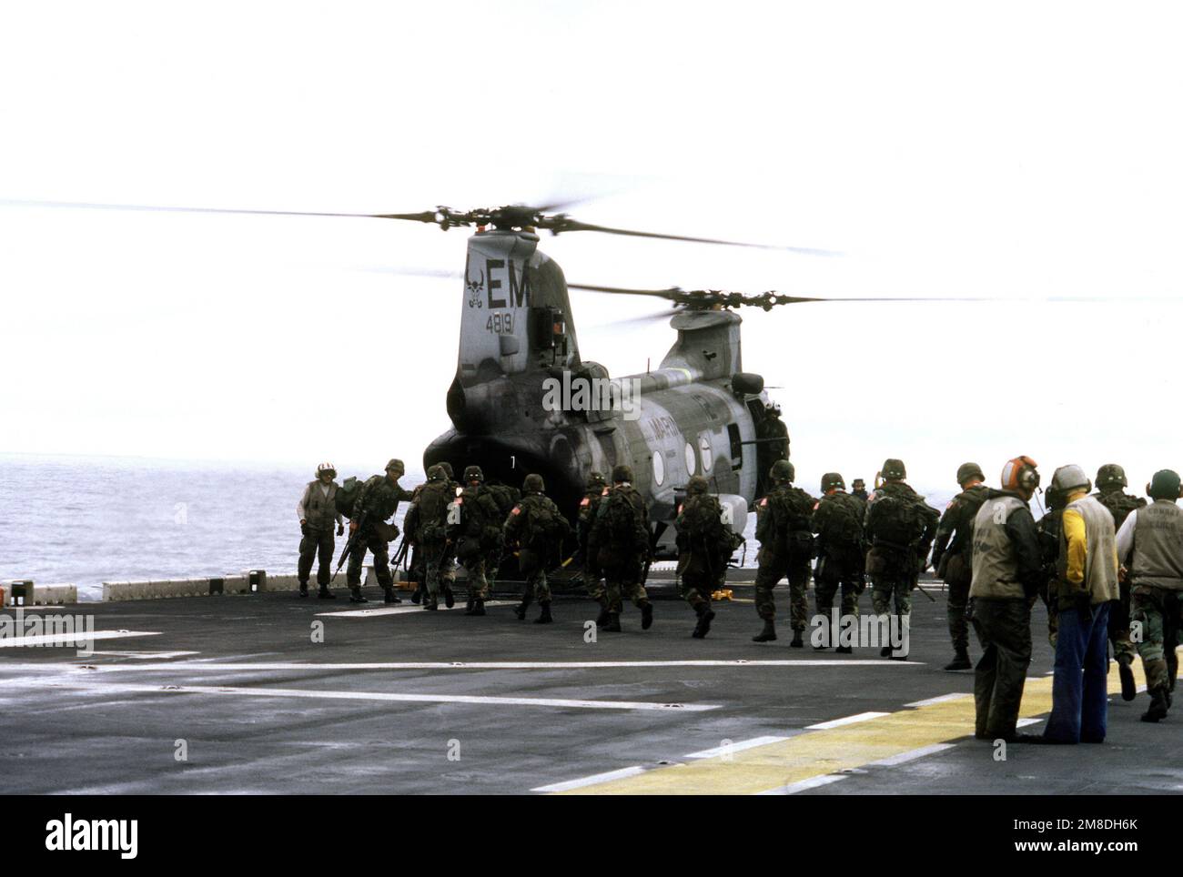Marines on the flight deck of the amphibious assault ship USS SAIPAN ...