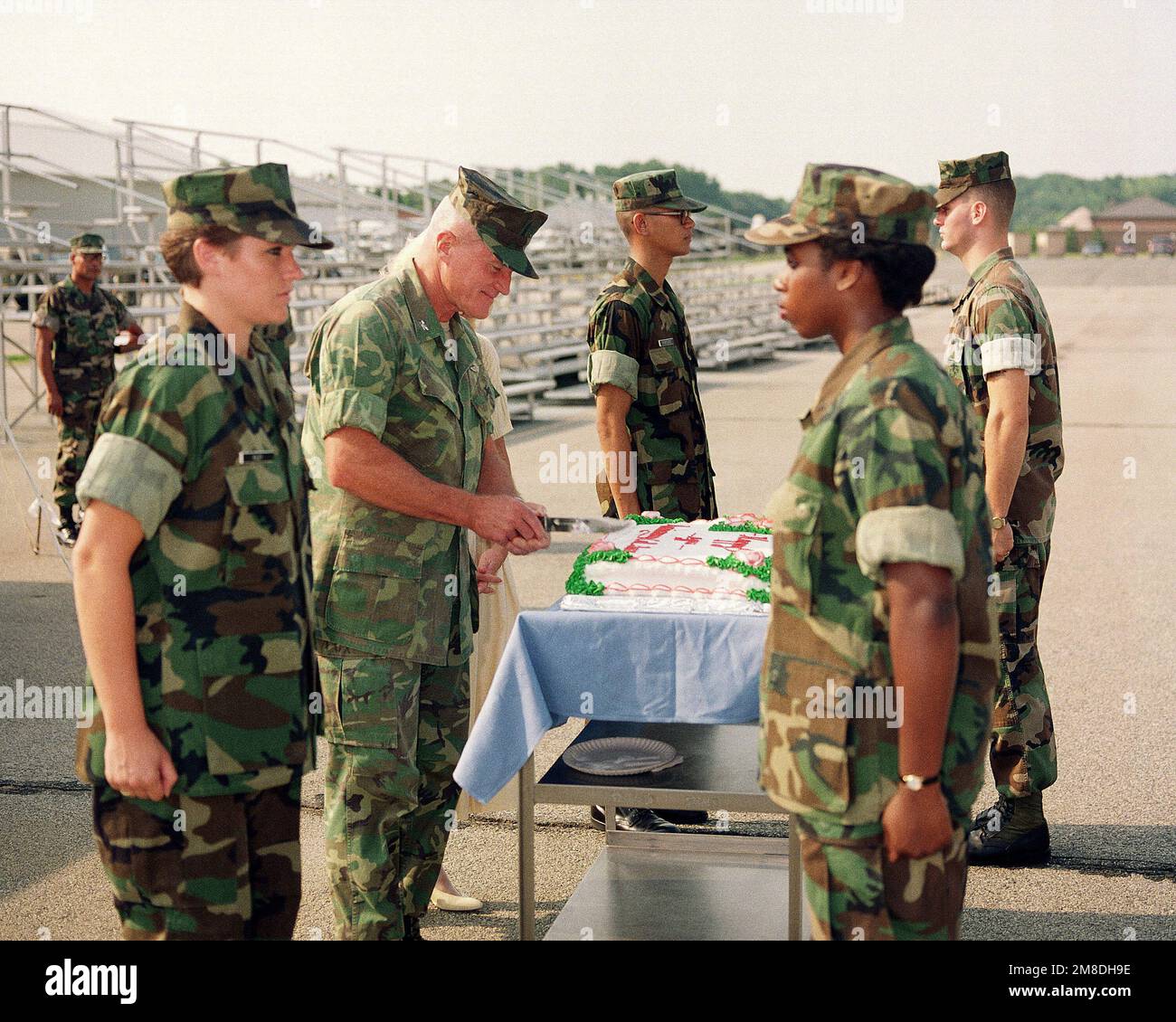 Medal of Honor recipient Colonel (COL) Wesley L. Fox cuts a cake during ...