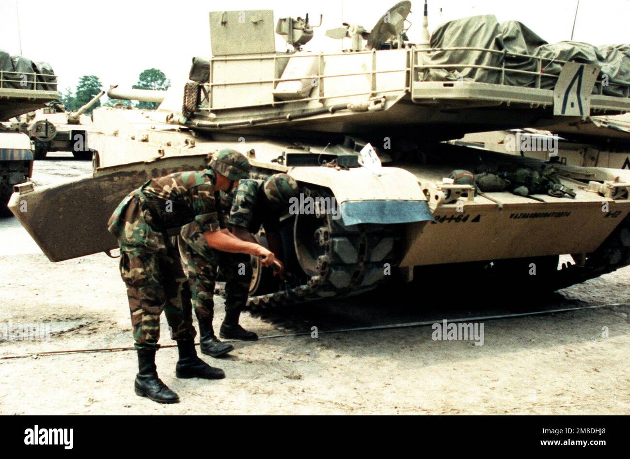 Two soldiers from Co. A, 1ST Bn., 64th Armor, 24th Inf. Div ...