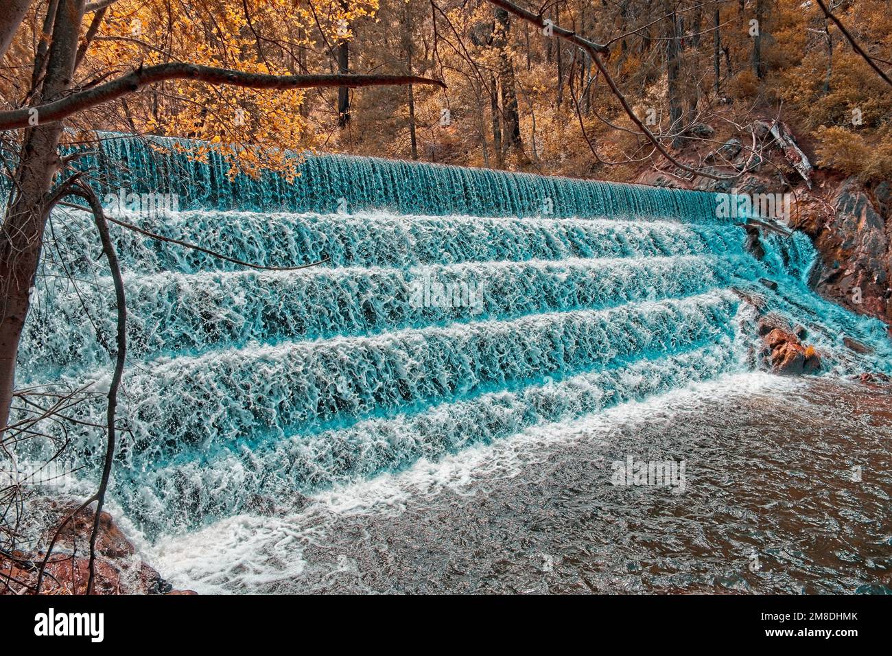 This is an interesting partial time-lapse photo of a man-made waterfall ...