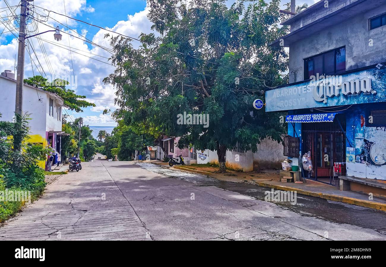 Colorful streets cars high traffic stores people buildings and trade in ...