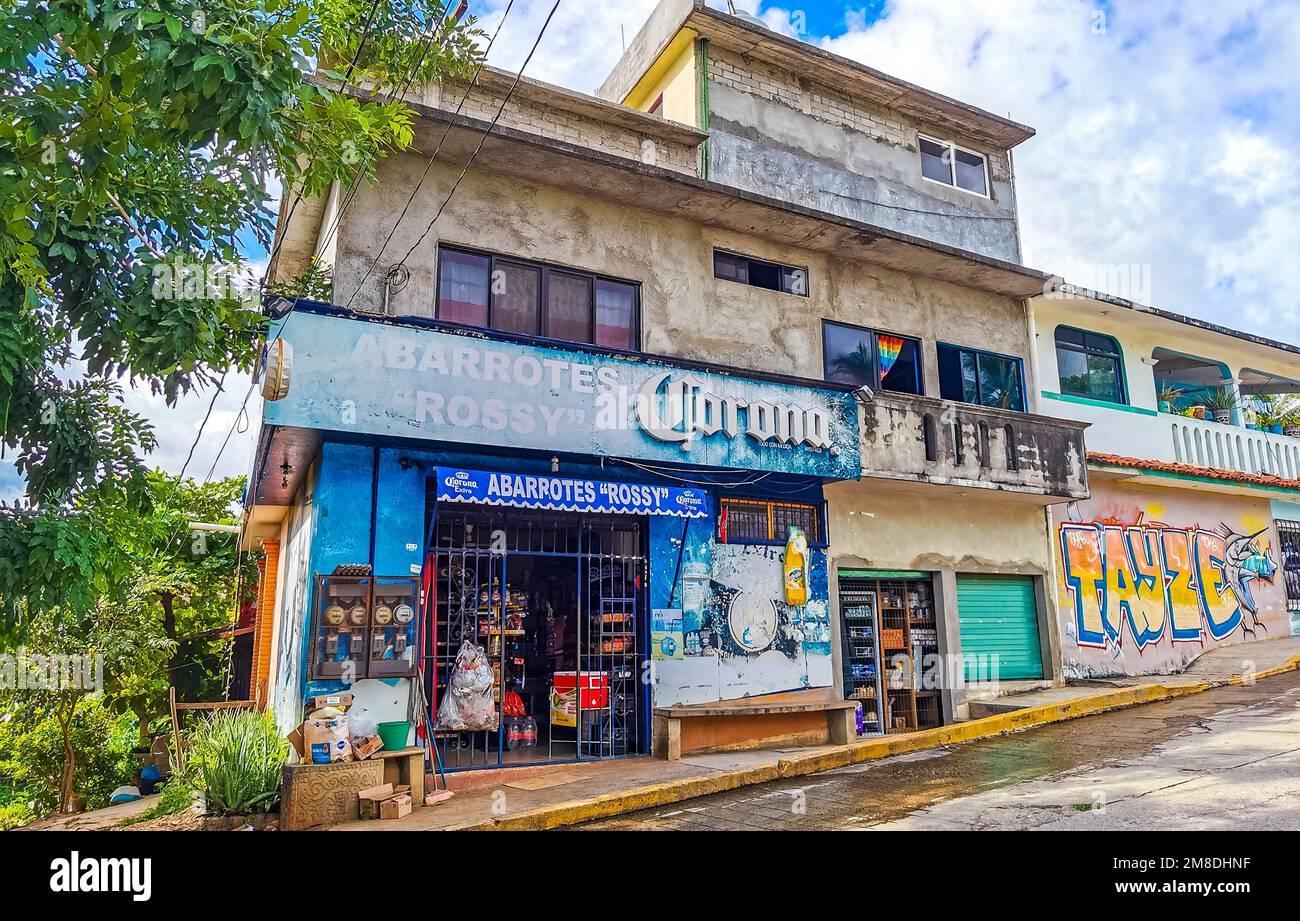 Colorful streets cars high traffic stores people buildings and trade in ...