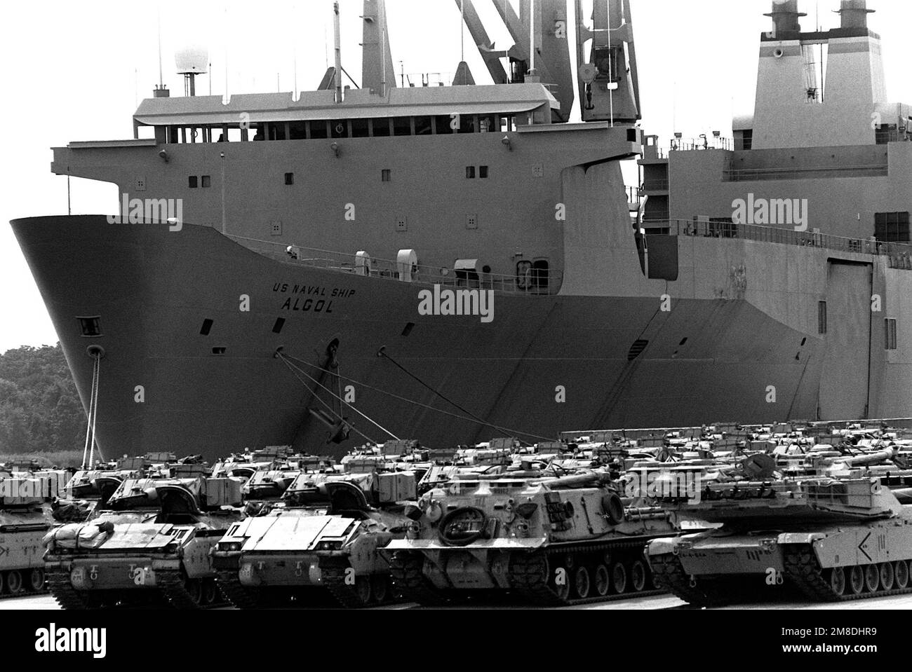 Equipment lines the pier in preparation for loading aboard the rapid ...