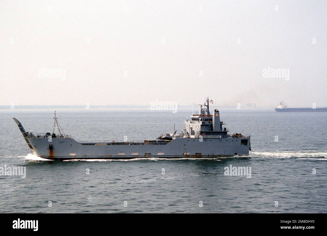 A port beam view of the vehicle landing ship GEN FRANK S. BESSON JR ...