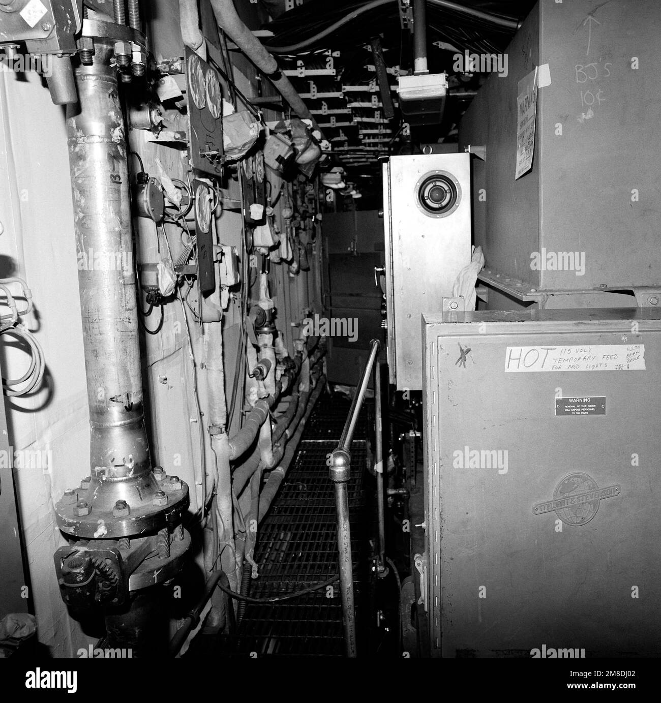 A view of ship's service generator No. 3 room aboard the guided missile ...