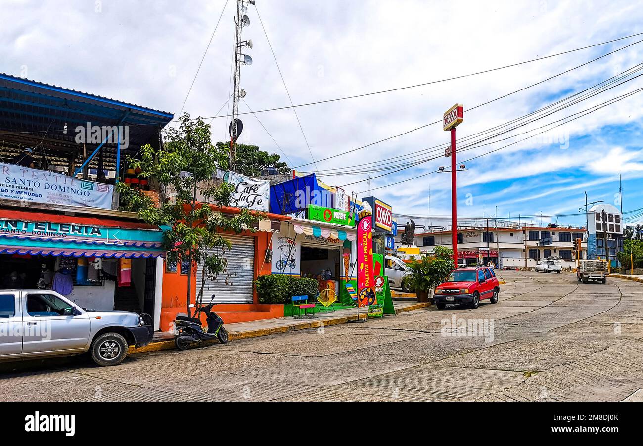 Colorful streets cars high traffic stores people buildings and trade in ...