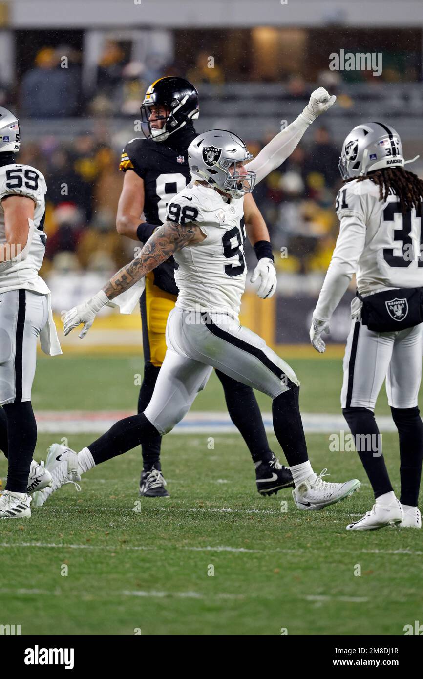 Las Vegas Raiders defensive end Maxx Crosby (98) reacts after a play ...