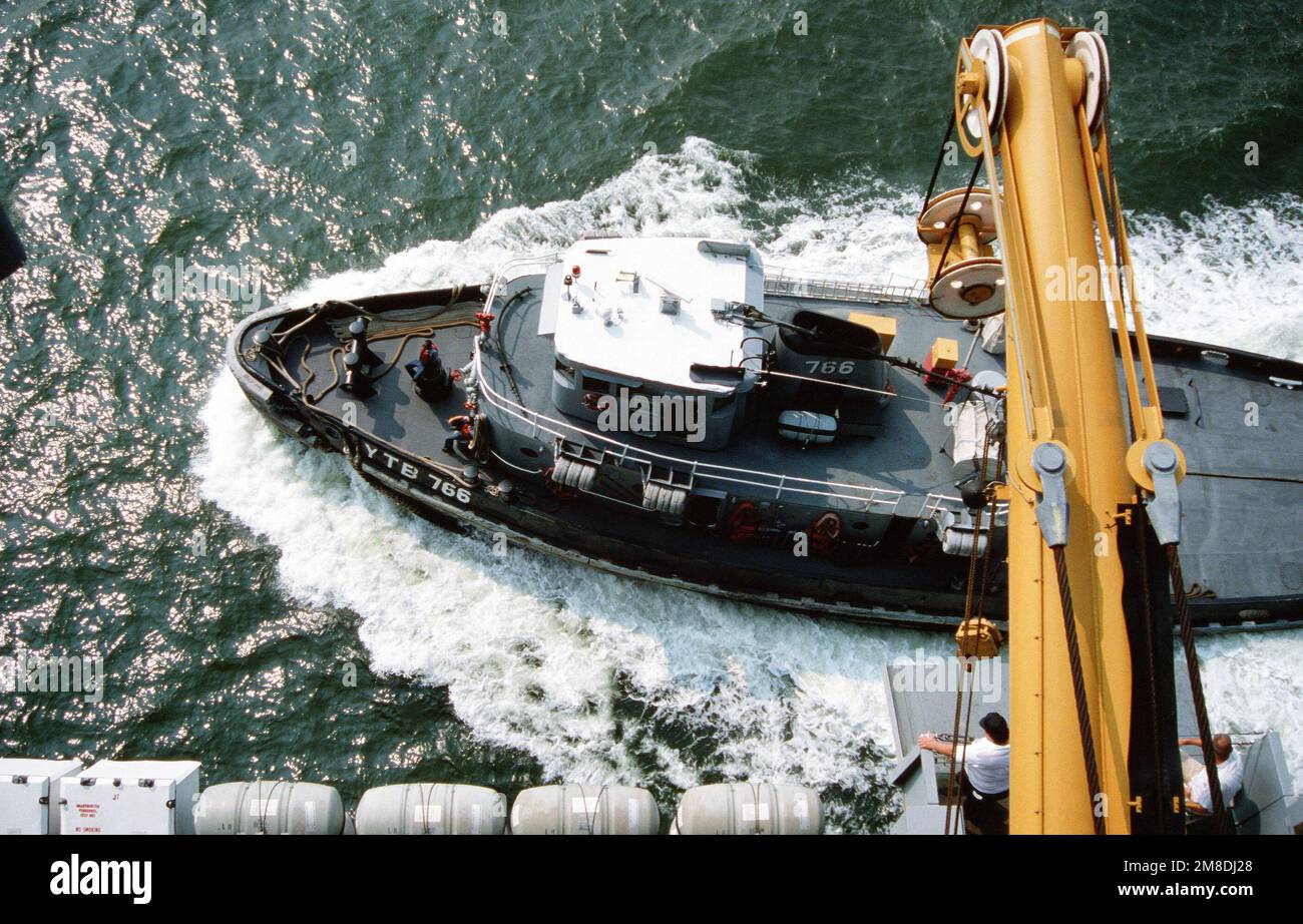 The large harbor tug WAPAKONETA (YTB 766) comes alongside the nuclear ...