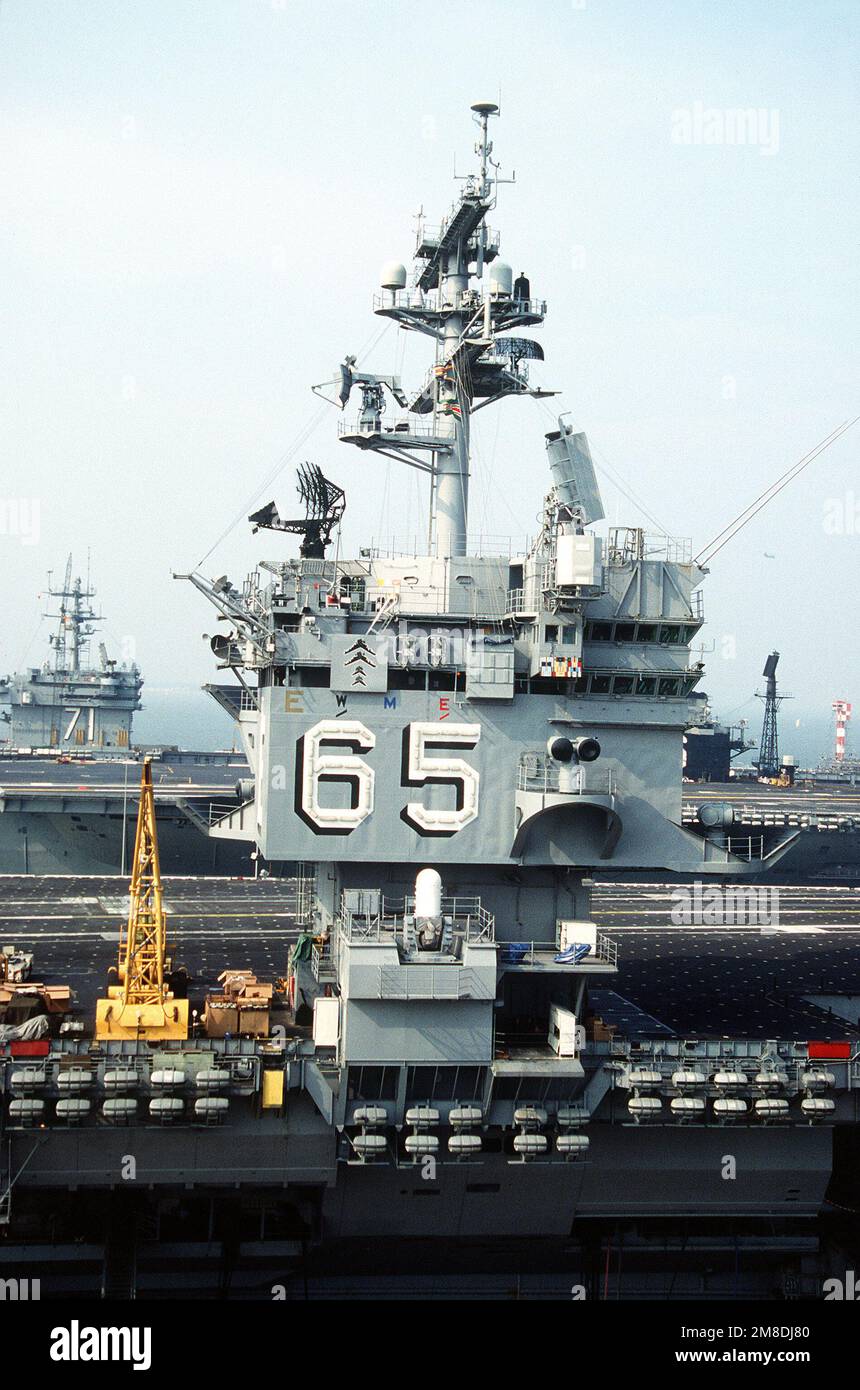 A view of the starboard side of the island of the nuclear-powered ...