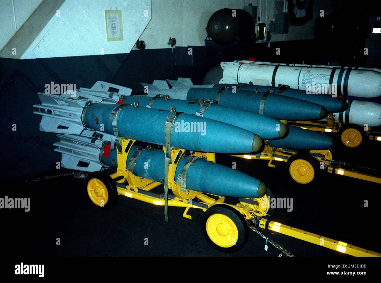 Five-hundred pound bombs and Mark 20 thermal cluster bombs are ...
