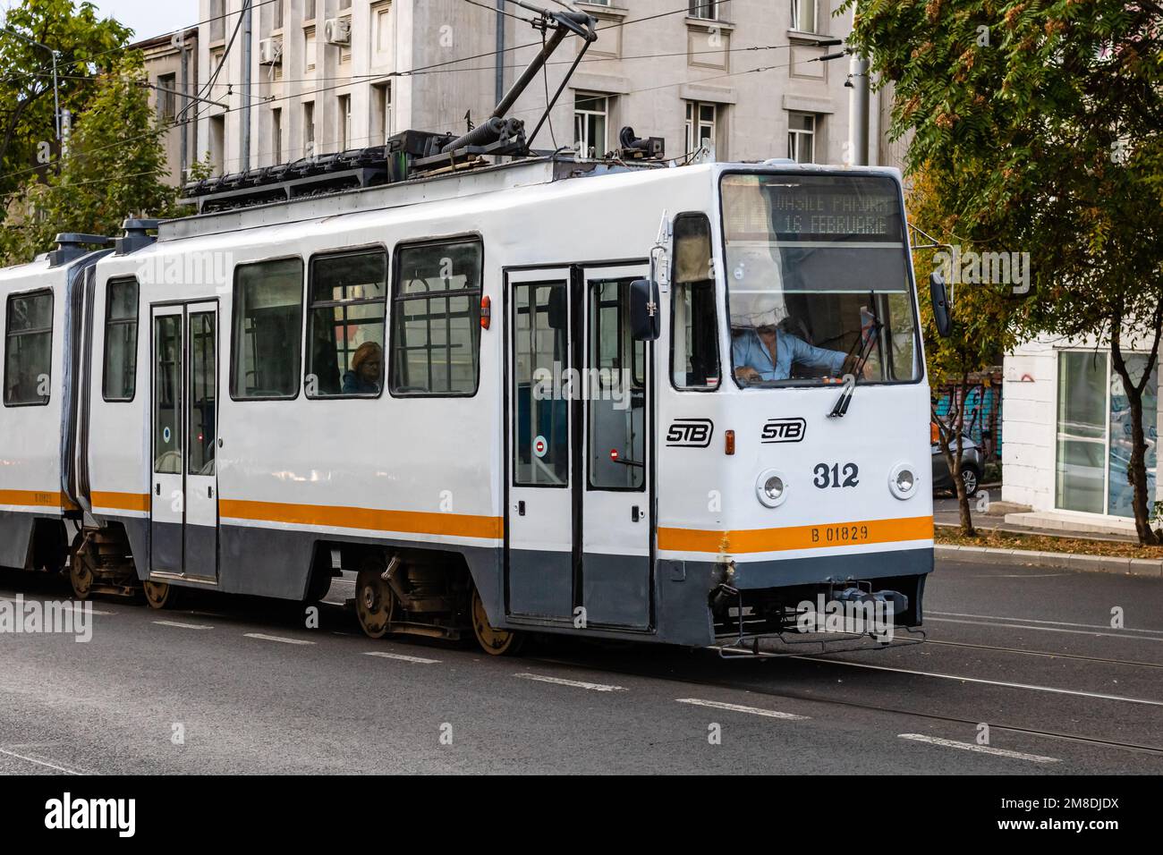 Tram in traffic. Public transport Bucharest, Romania, 2022 Stock Photo ...