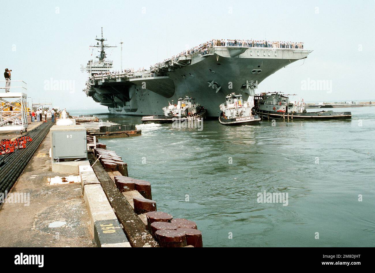 The large harbor tugs MENOMINEE (YTB-790), WAPAKONETA (YTB-766) and ...