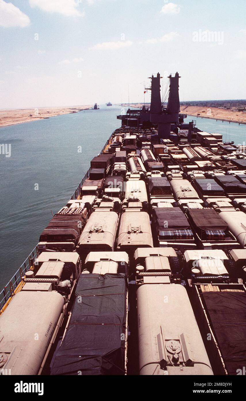 Loaded with equipment, the rapid-response vehicle cargo ship USNS ...