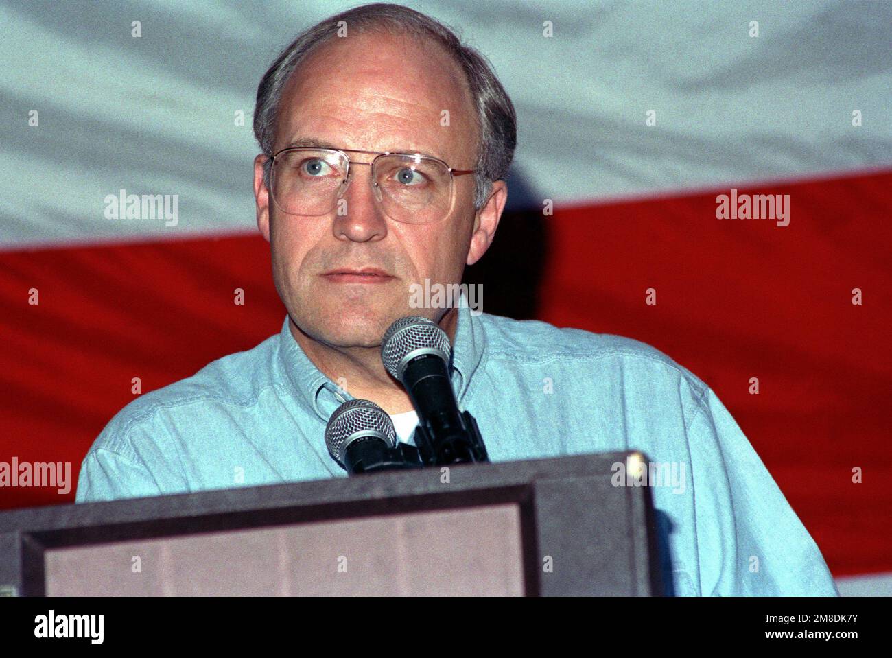 Secretary of Defense Richard Cheney speaks to crew members during a ...