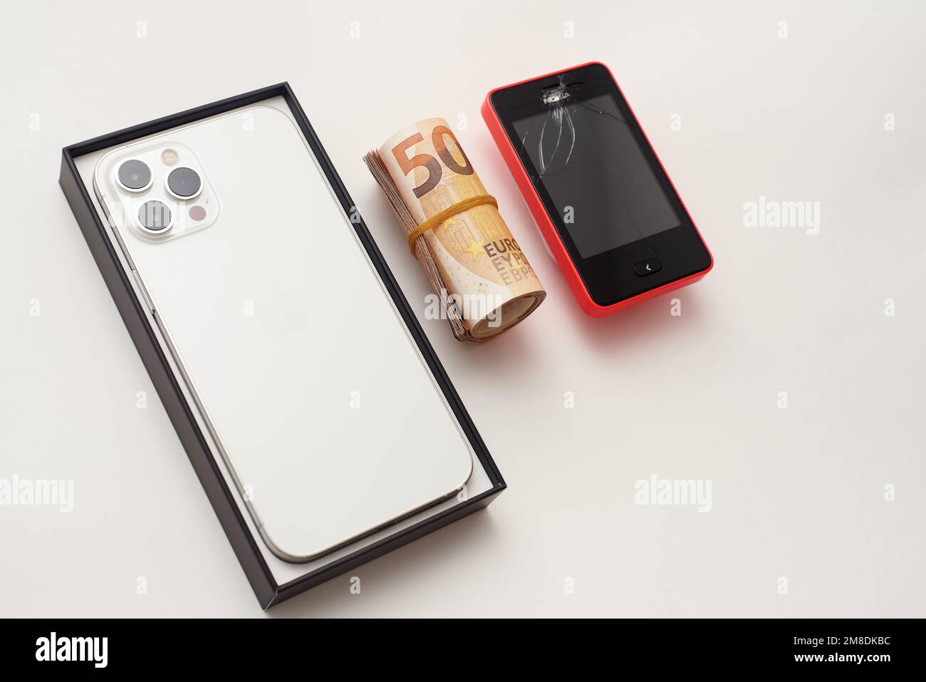 New smartphone on table next to the old phone, Buying a new phone Stock ...