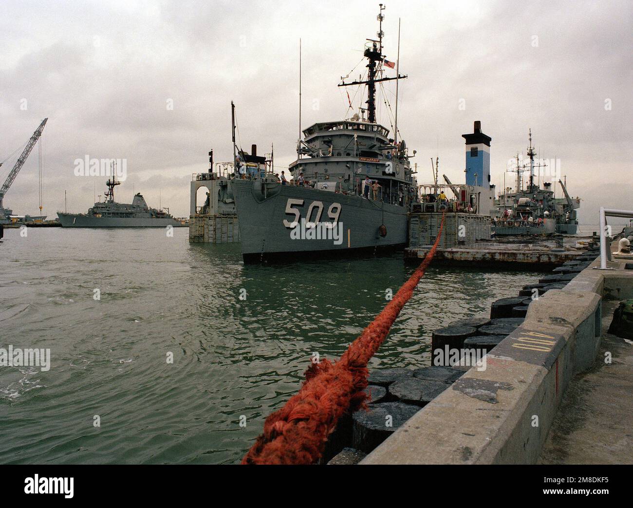 The ocean minesweeper USS ADROIT (MSO-509) lies tied up over the ...