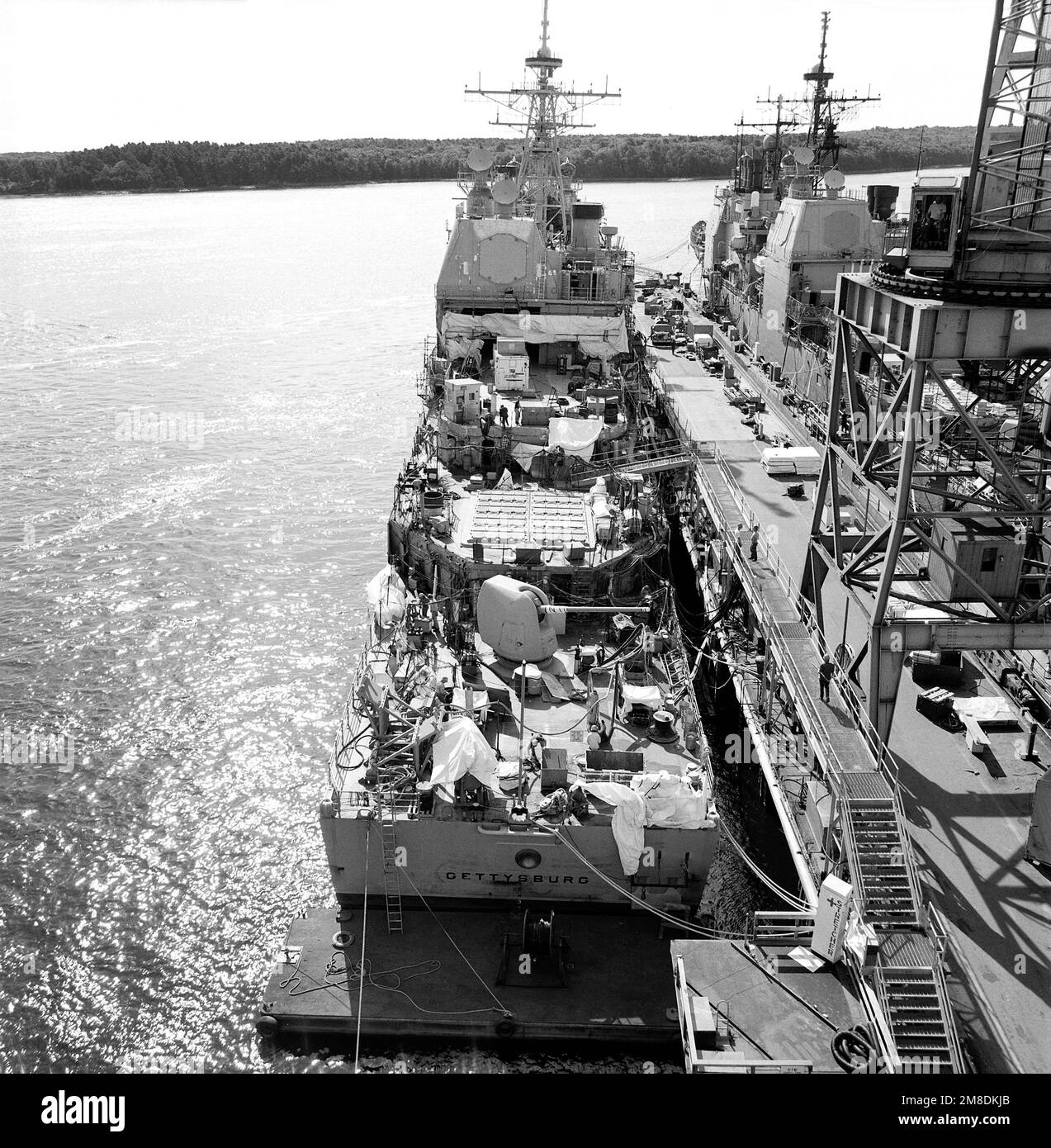 A stern view of the guided missile cruiser GETTYSBURG (CG 64) moored at ...