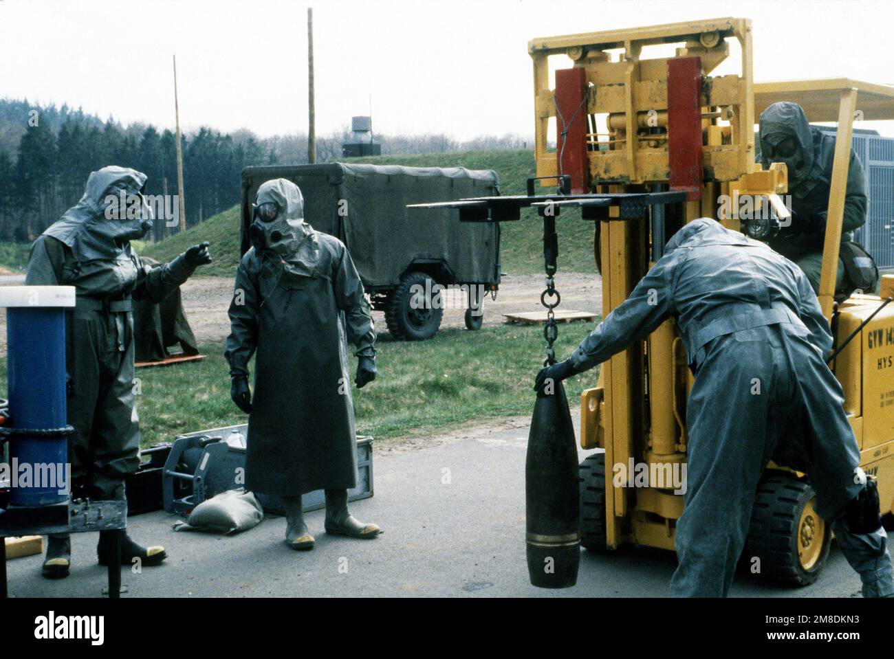 Soldiers wearing nuclear-biological-chemical (NBC) protective suits and ...